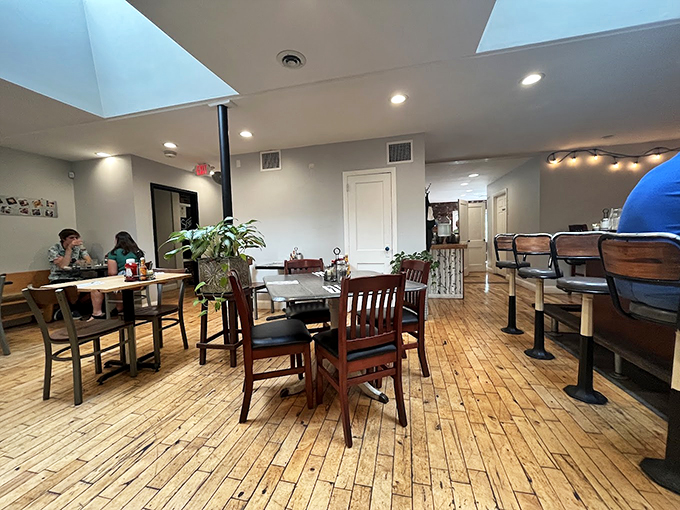Wooden floors that have witnessed countless breakfast epiphanies. The dining room at Sneakers balances cozy and airy, like your favorite aunt's kitchen after a renovation.