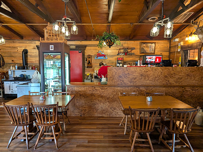 Step inside and you're transported to a world where wooden beams, rustic charm, and the promise of comfort food create the perfect Tennessee hideaway.