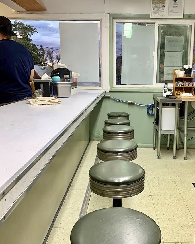 Those vintage chrome stools are where Moab locals have been settling in for legendary burgers through the decades.