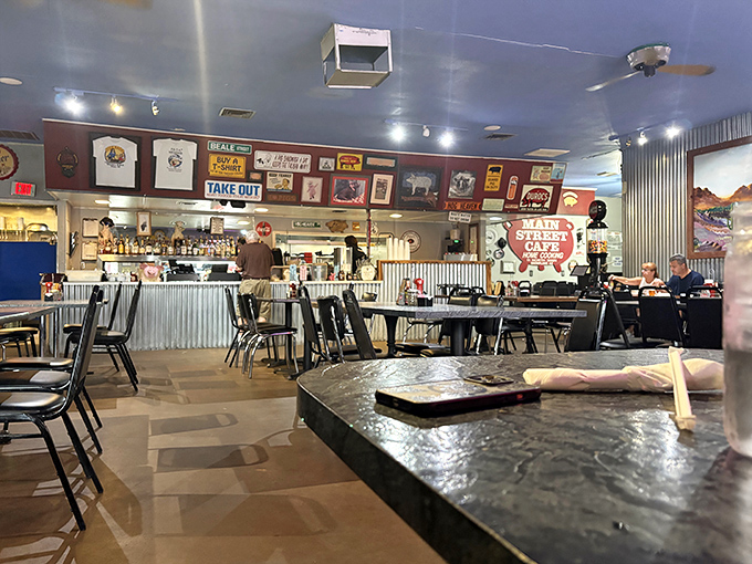Inside, corrugated metal walls and pig-themed memorabilia create that perfect "we care more about the meat than the d&eacute;cor" authenticity that great BBQ joints require.