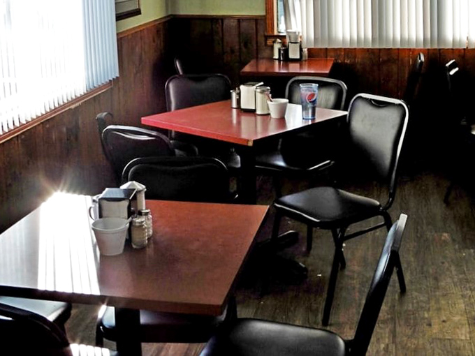 Wood paneling and no-nonsense tables &ndash; dining rooms like this are America's true cathedrals. No Instagram filters needed, just honest food and conversation. 