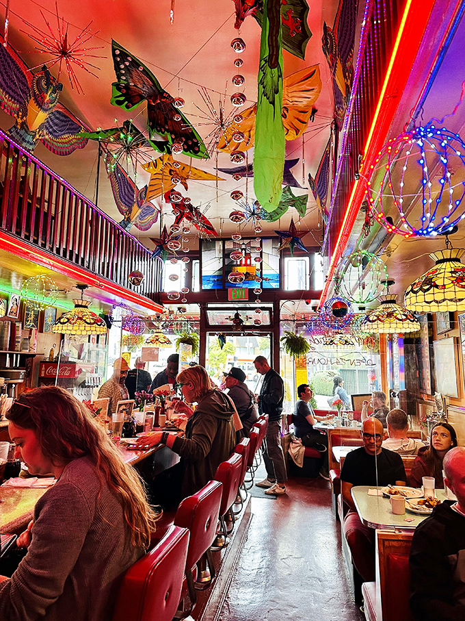 Step inside and look up&mdash;this isn't just a diner, it's a kaleidoscopic wonderland where kites and disco balls dance overhead while pancakes sizzle below. 