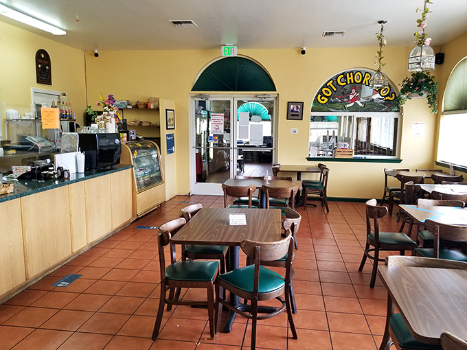 Yellow walls and terracotta tiles create the perfect backdrop for food magic. That "Got Chorizo?" sign isn't just decoration&mdash;it's a philosophy.