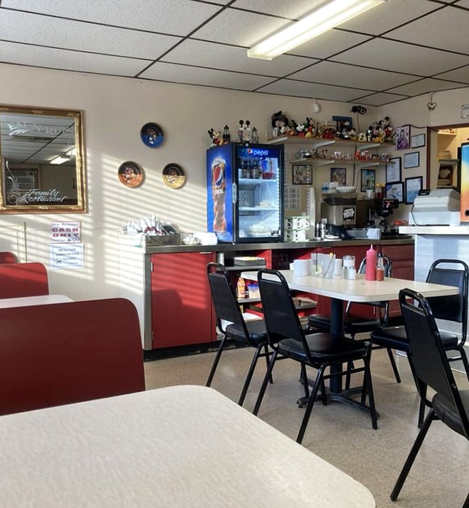 Mickey Mouse watches over diners from his shelf perch. This isn't Disney magic&mdash;it's the authentic charm of a place where breakfast dreams come true.