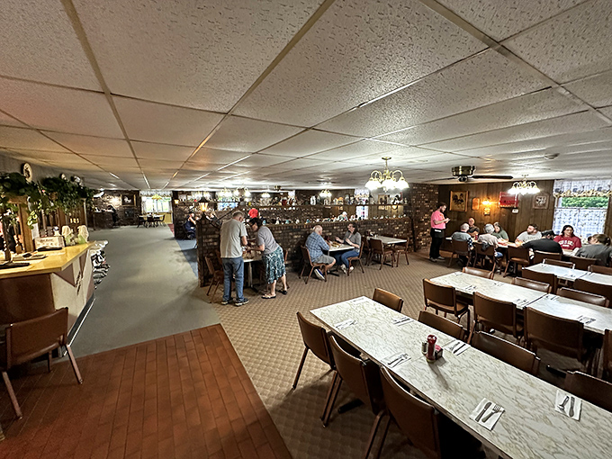 Inside, time stands deliciously still. Wood-paneled walls and simple tables create the perfect stage for the star attraction: that legendary chicken.