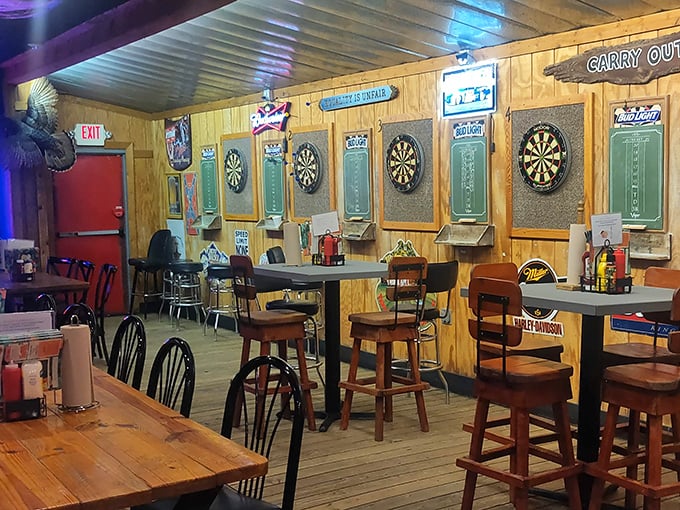 Dart boards line the walls like sentinels guarding good times. In this wood-paneled sanctuary, every bull's-eye is celebrated and every miss quickly forgotten.