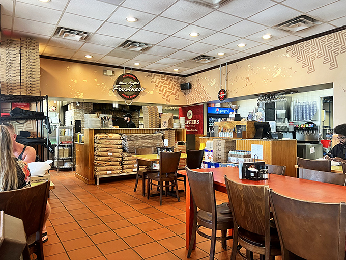 Inside, the terra cotta floors and wooden tables create a casual vibe where the only pretension is the commitment to perfect pizza.