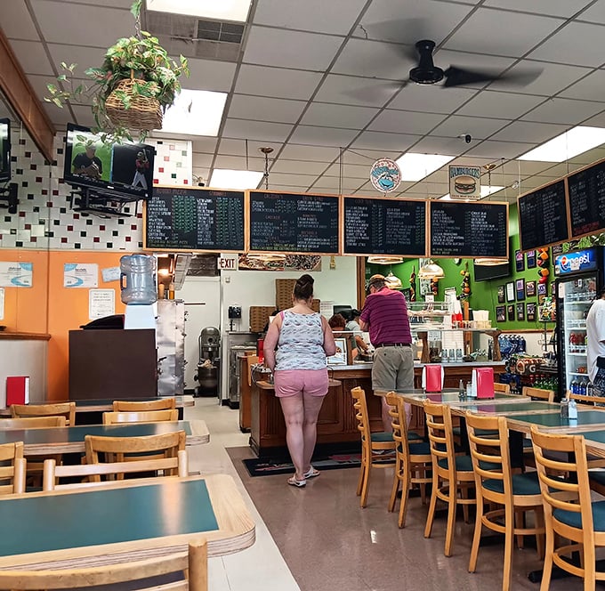 Inside, the no-frills dining area speaks volumes: when the menu boards are this extensive and the tables this well-worn, you know you're in for authentic goodness.