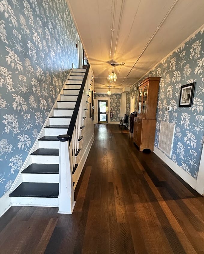 Walking through these hallways feels like stepping into a Tennessee time machine. That blue floral wallpaper has witnessed more Southern secrets than a church confessional.