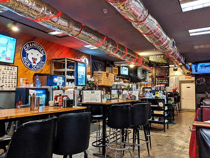 Inside, the wood paneling and exposed ductwork create that perfect diner atmosphere&mdash;like stepping into a time machine set to "comfort food o'clock."