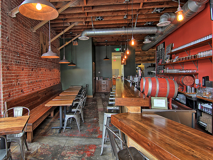 Exposed brick, wooden beams, and industrial lighting create the perfect backdrop for the meat-centric masterpieces to come.