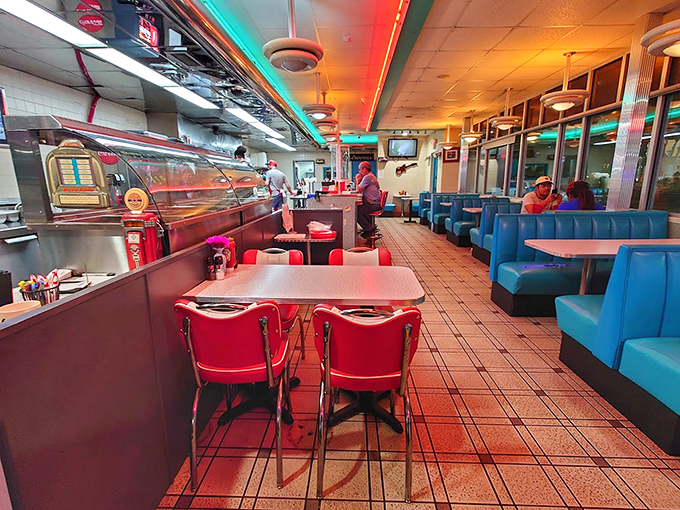 Classic Americana meets Southern comfort in this interior where the booths have witnessed more life stories than a barber's chair.