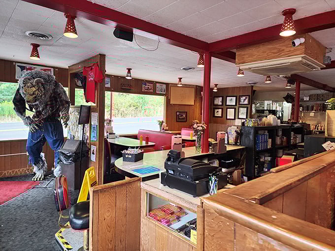 Step inside and time stands still &ndash; wood paneling, red vinyl booths, and a sasquatch greeter create the perfect backdrop for burger-based memories.