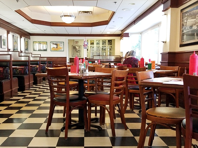 The classic black and white checkered floor isn't just nostalgic design&mdash;it's the universal signal that honest-to-goodness diner food awaits.