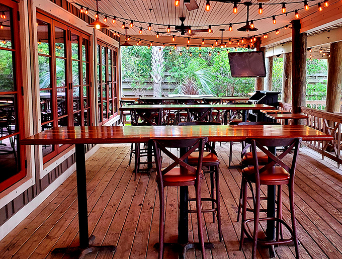 String lights, wooden beams, and ocean breezes&mdash;this patio seating area turns casual dining into a memory you'll revisit during winter.