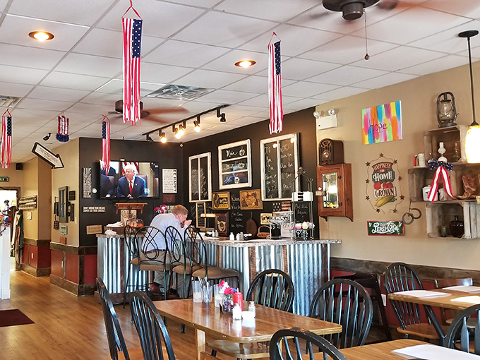 American flags hang proudly while Windsor chairs await &ndash; this isn't just a restaurant, it's a Norman Rockwell painting where you can actually eat.