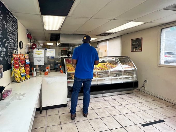 The no-frills interior keeps the focus where it belongs: on that glorious display case of freshly made morning magic.