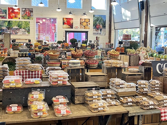 A cornucopia of abundance awaits inside, where rustic wooden displays showcase nature's bounty in a way no supermarket could ever replicate.