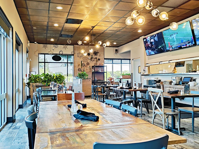 Inside, rustic wooden tables and globe lighting create that perfect "fancy-but-not-too-fancy" vibe where you can comfortably lick your plate clean.