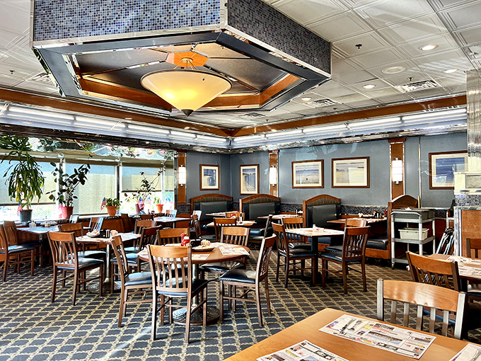 Step inside to a world where blue walls meet warm wood tones, where every booth tells a story, and where strangers become regulars over coffee.