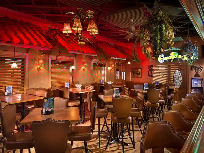 Step inside and the tropical transformation is complete. Red-tinted thatch roofing and hanging plants create an unexpected island getaway in the Mountain State.