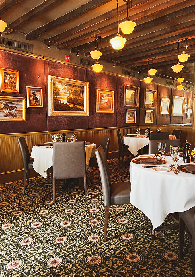 Step inside and time slows down—rich mahogany walls, amber lighting, and white tablecloths set the stage for meat-lover magic.