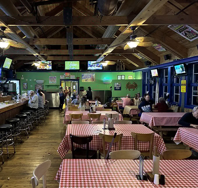 Red checkered tablecloths and exposed beams create that perfect "eating with the family" vibe that fancy restaurants spend fortunes trying to replicate.