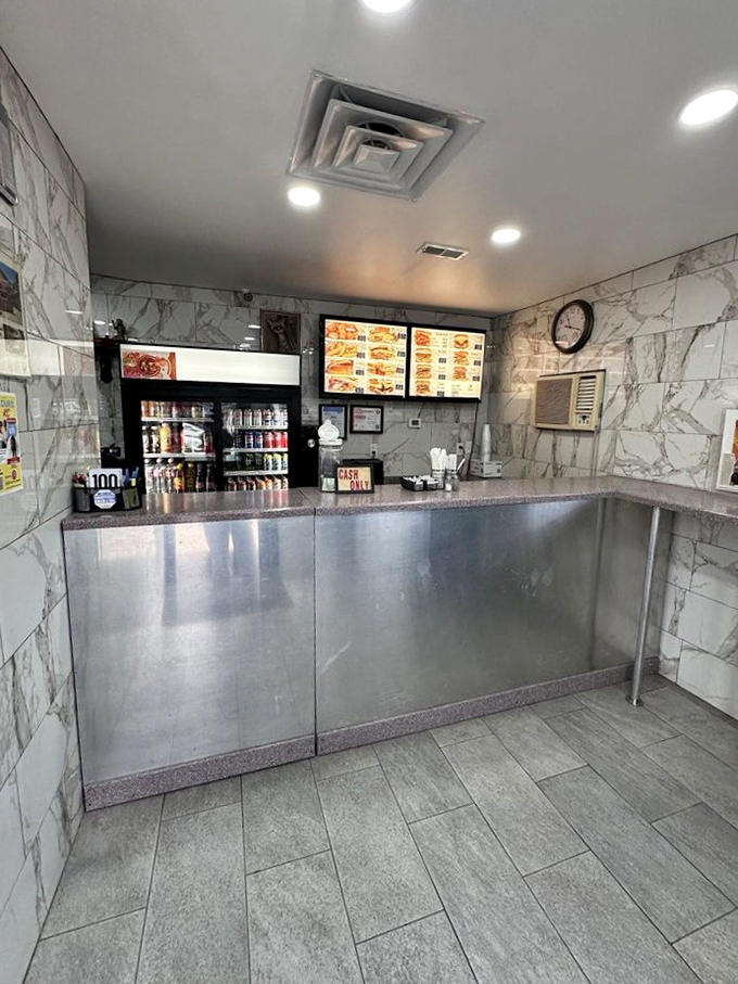 Inside, marble-patterned walls and a no-nonsense counter create the perfect stage for sandwich artistry that's remained unchanged for decades.
