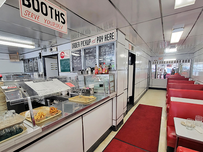Red vinyl booths and white countertops create a time machine effect that requires no flux capacitor, just an appetite.
