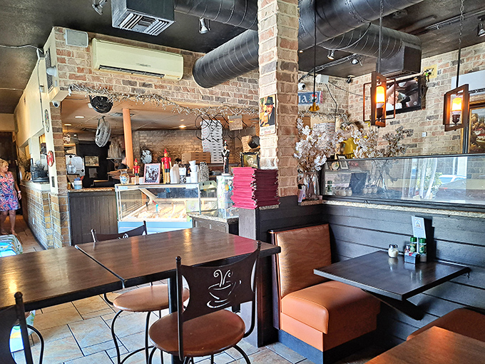 Inside, exposed brick walls and cozy seating create that perfect neighborhood vibe where you'll want to linger long after your meal is finished.