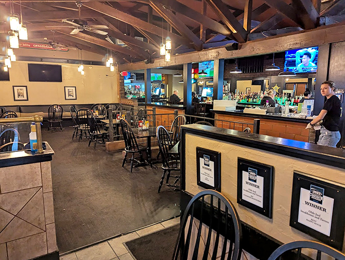 Exposed wooden beams and Windsor chairs create that perfect "come as you are, stay as long as you'd like" tavern atmosphere.