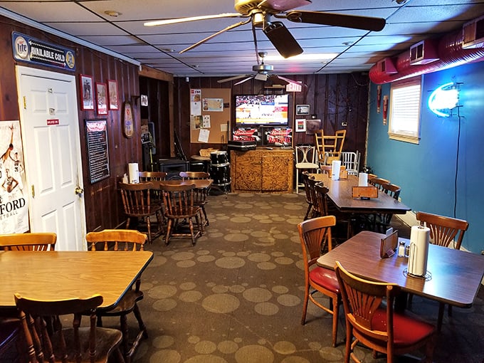 Where mismatched chairs tell stories and ceiling fans keep the secrets. Nu-Way's interior feels like your favorite uncle's basement &ndash; if he could cook like a genius.