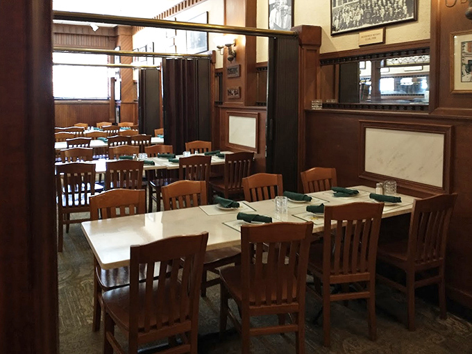 Step inside and time travel through Alabama's culinary history, where wood paneling and vintage photographs create the perfect backdrop for memorable meals.