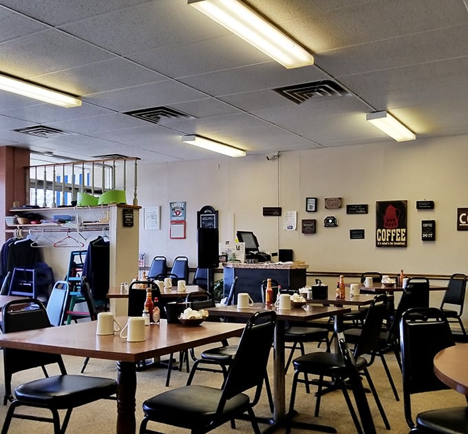 No-frills interior where breakfast dreams come true. The coffee signs on the wall aren't lying—this place takes morning fuel seriously.