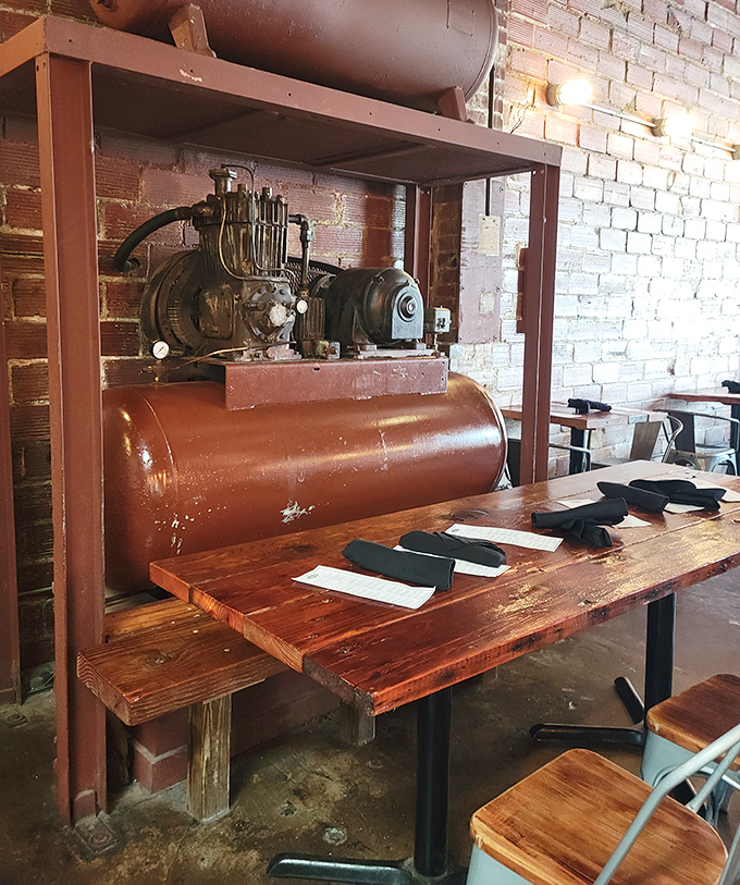Industrial heritage meets culinary present &ndash; this vintage compressor isn't just decoration, it's a conversation starter while you wait for your steak.