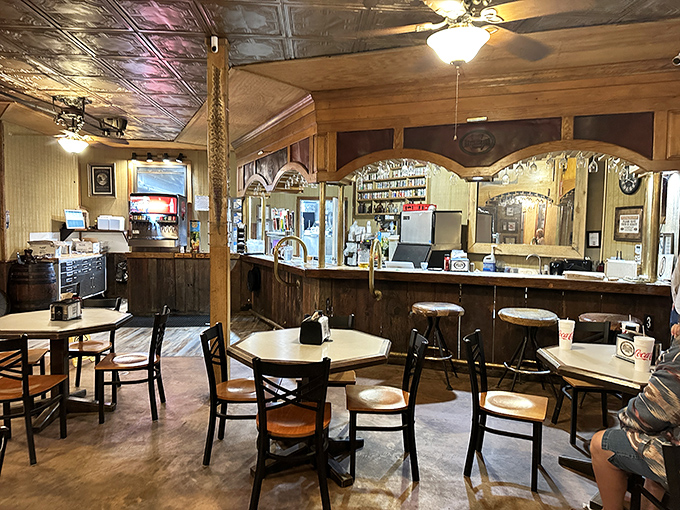 Inside, the saloon's warm wood paneling and tin ceiling create the perfect blend of cave dwelling and Western charm. John Wayne would approve of these saddle-seat bar stools.