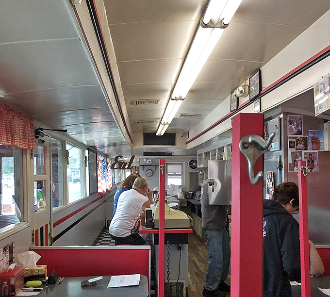 The narrow, railroad-style interior with its red booths and counter seating is the culinary equivalent of a warm hug from your favorite aunt.