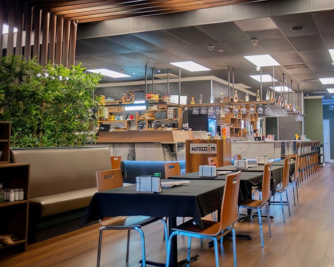 Clean lines and wooden accents create a zen-like atmosphere where the food becomes the undisputed star of the show.