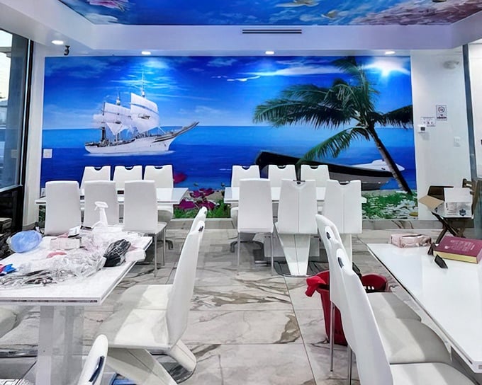 Step inside and you're transported to a coastal getaway. The ocean mural creates a vacation vibe that makes you forget you're in the desert.