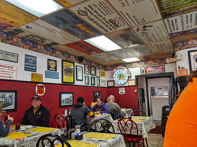 Step inside and the ceiling tells stories &ndash; local ads, memories, and quirky notes create a living museum above diners' heads. It's organized chaos that somehow feels like home.
