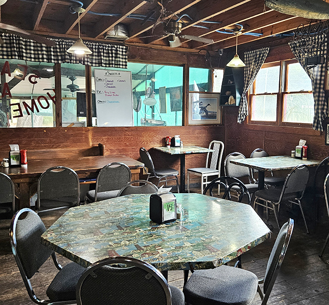 Step inside and time slows down. Wooden beams, checkered curtains, and well-worn tables tell stories of countless meals shared in this unpretentious haven.