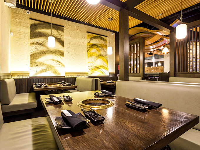 Not just a pretty face&mdash;each table transforms into your personal culinary canvas, complete with built-in grill and mood lighting.