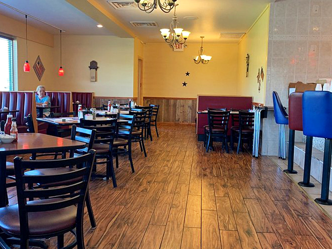 Inside, warm wood tones and comfortable seating create the perfect backdrop for morning philosophizing or afternoon feasting. The chandeliers add just enough fancy to your flapjacks.