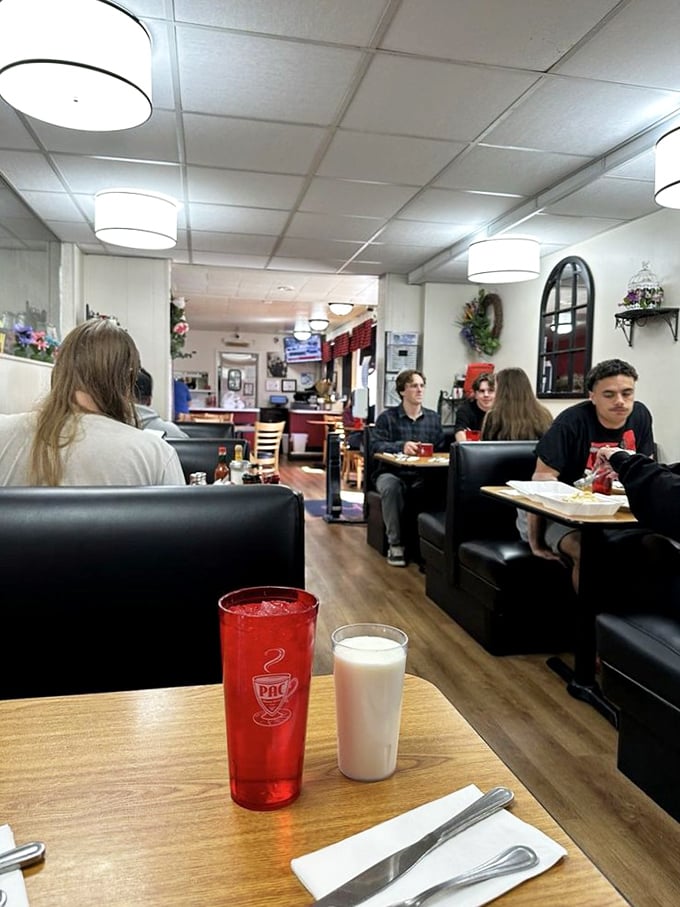 Those signature red cups and black booths create the perfect backdrop for breakfast magic. No designer furniture needed when the food does all the talking.