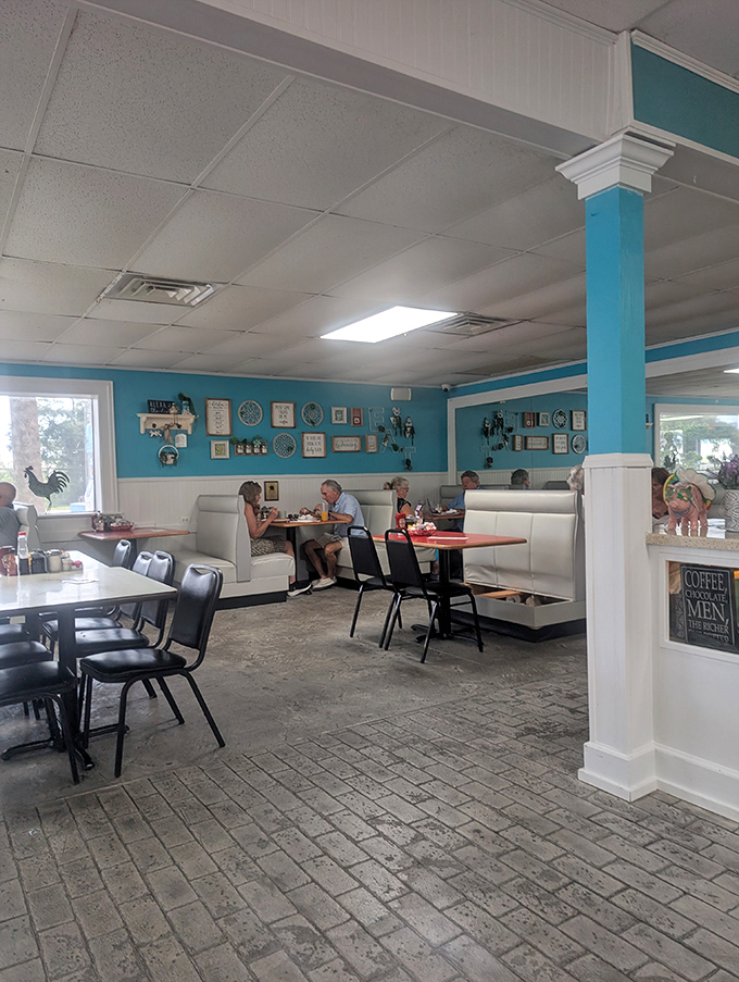 Step inside and the turquoise walls embrace you like an old friend, while the cozy booths practically whisper, "Stay awhile, won't you?"