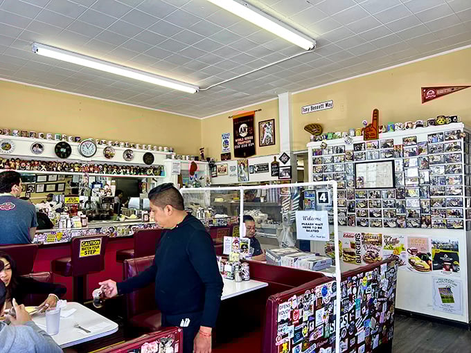 The interior walls serve as a community scrapbook, with hundreds of photos and mementos creating a visual history more authentic than any curated Instagram feed.