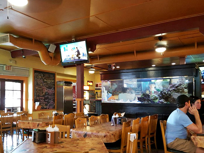 Step inside and you're transported to barbecue's promised land &ndash; wooden tables, ceiling fans, and the hypnotic dance of smoke behind glass.