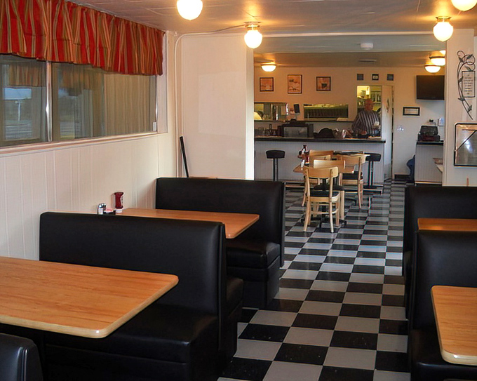 Classic diner charm with those black and white checkered floors. The kind of place where calories don't count and coffee refills are mandatory.