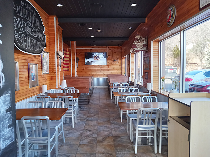 Wooden walls and simple seating tell you they're focused on what matters. This isn't fancy dining &ndash; it's serious barbecue business in a cozy, unpretentious space.