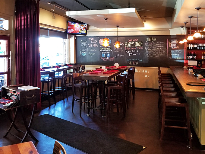 Inside, chalkboard menus and warm lighting create that perfect "neighborhood gem" atmosphere where regulars nod knowingly at first-timers about to have their burger epiphany.